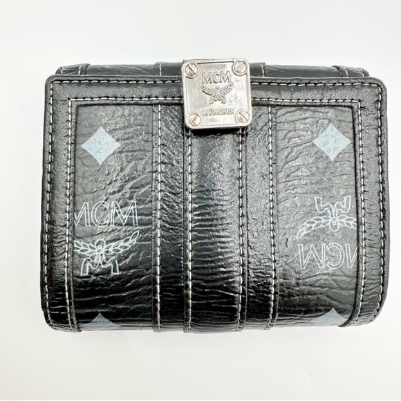 MCM | Bags | Euc Mcm Visetos Leather Wallet Unique Silver Hardware ...